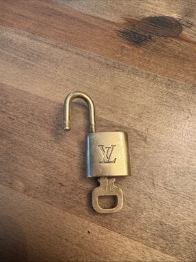 Louis Vuitton | Bags | Louis Vuitton Gold Brass Padlock With Matching ...